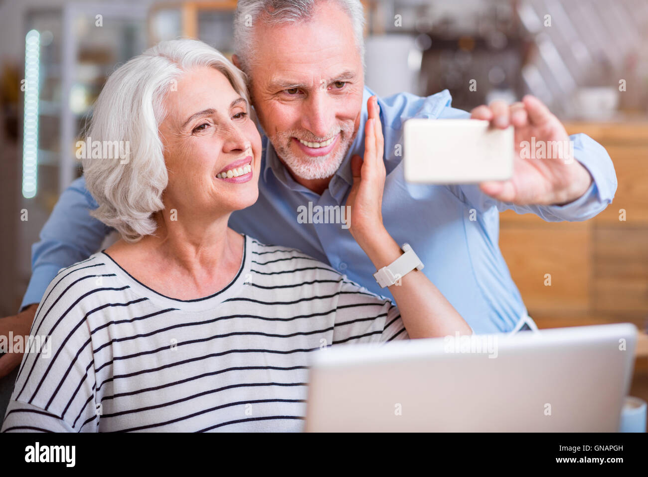 Cheerful couple making selfies Stock Photo - Alamy