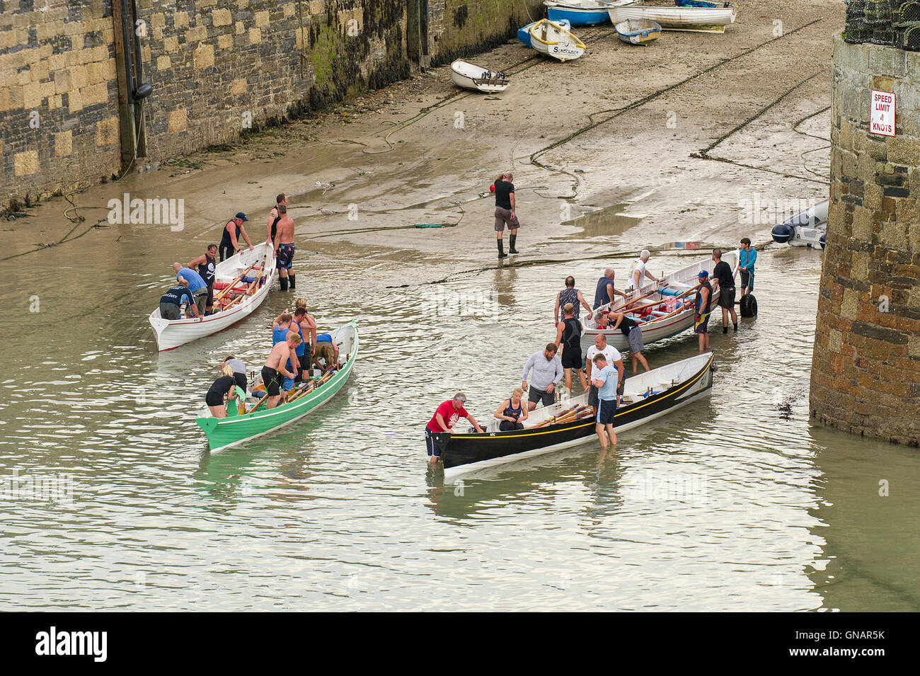 Competitors in a Cornish Pilot Gig race return to Newquay Harbour in ...