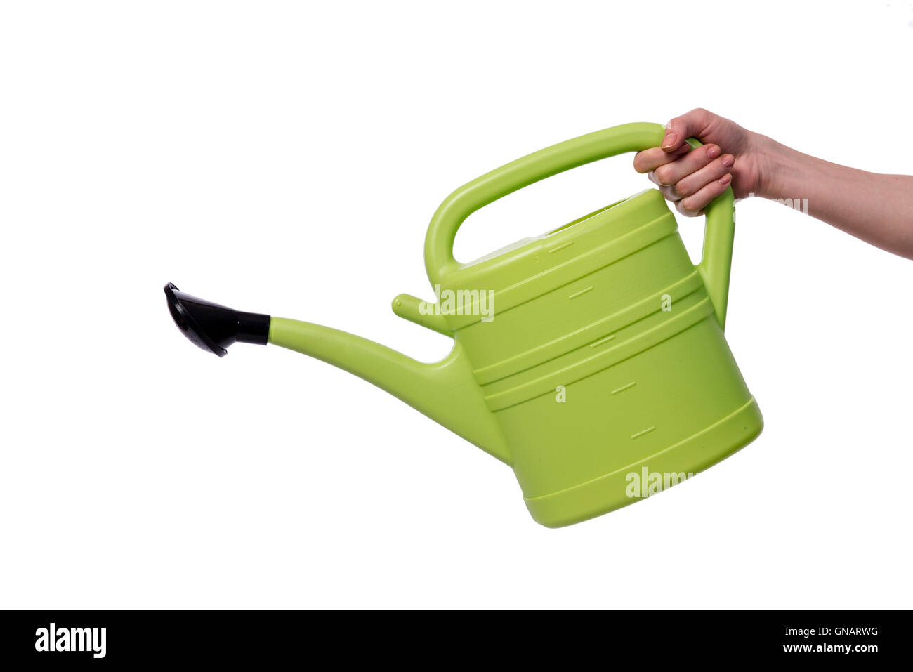 Hand holding watering can isolated on white Stock Photo - Alamy