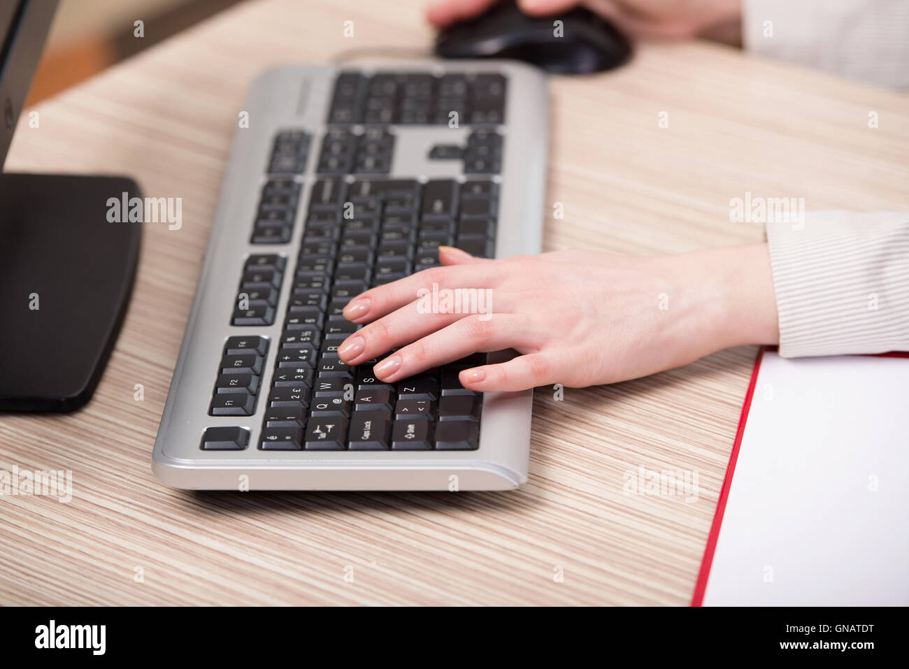 Hands working on the keyboard in the office Stock Photo - Alamy