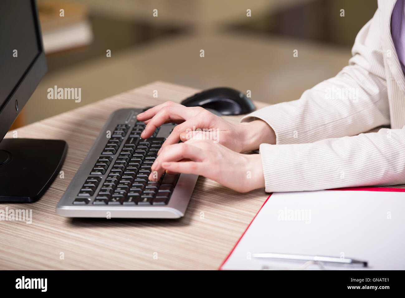Hands working on the keyboard in the office Stock Photo - Alamy