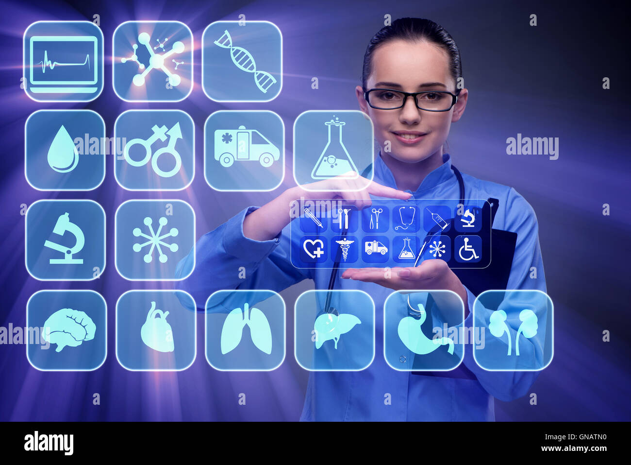 Woman doctor pressing buttons with various medical icons Stock Photo ...