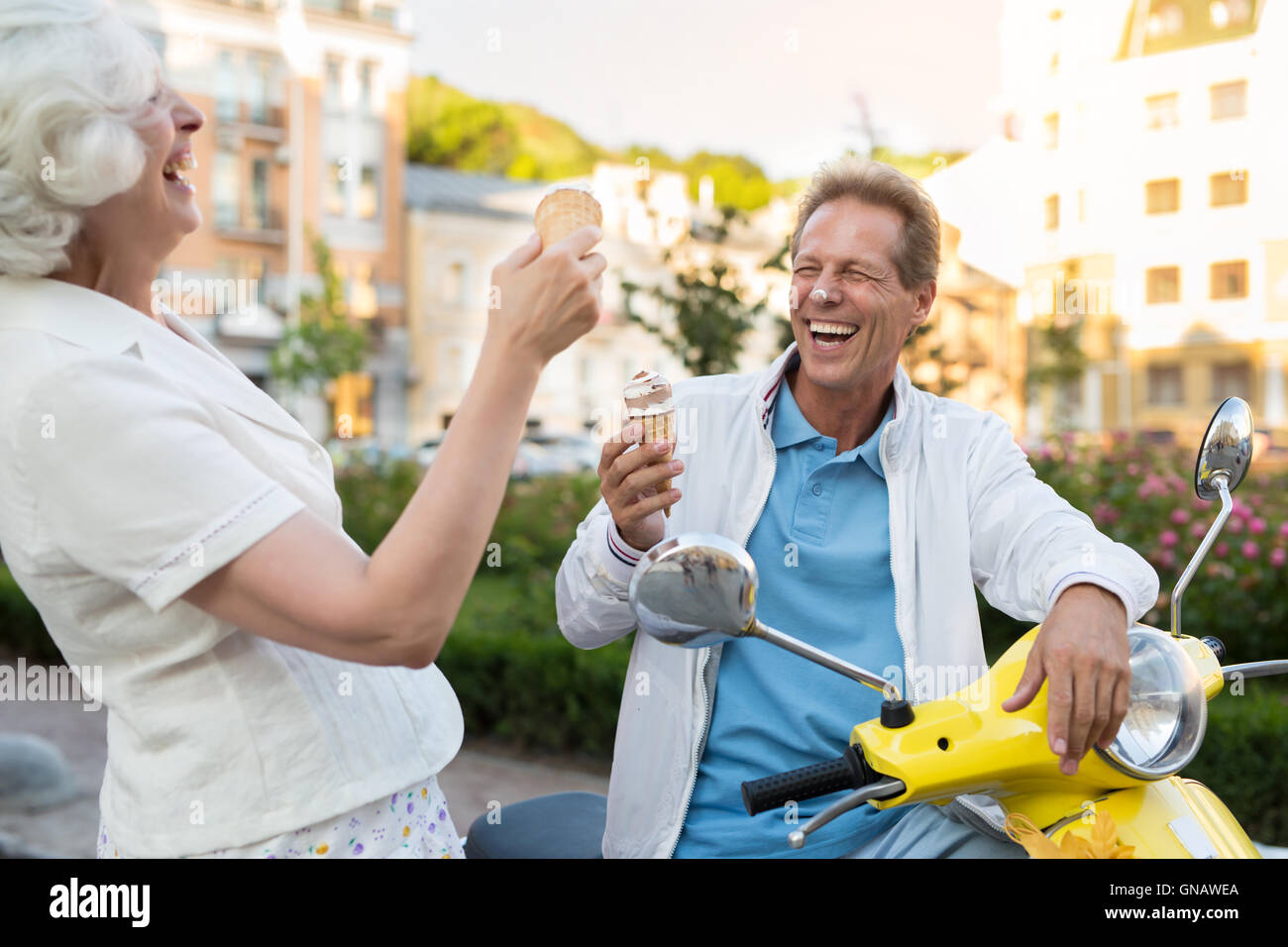 Eat laughing mature woman hi-res stock photography and images - Alamy