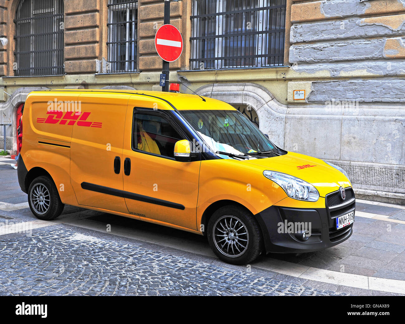 Yellow dhl delivery van parked hi-res stock photography and images - Alamy