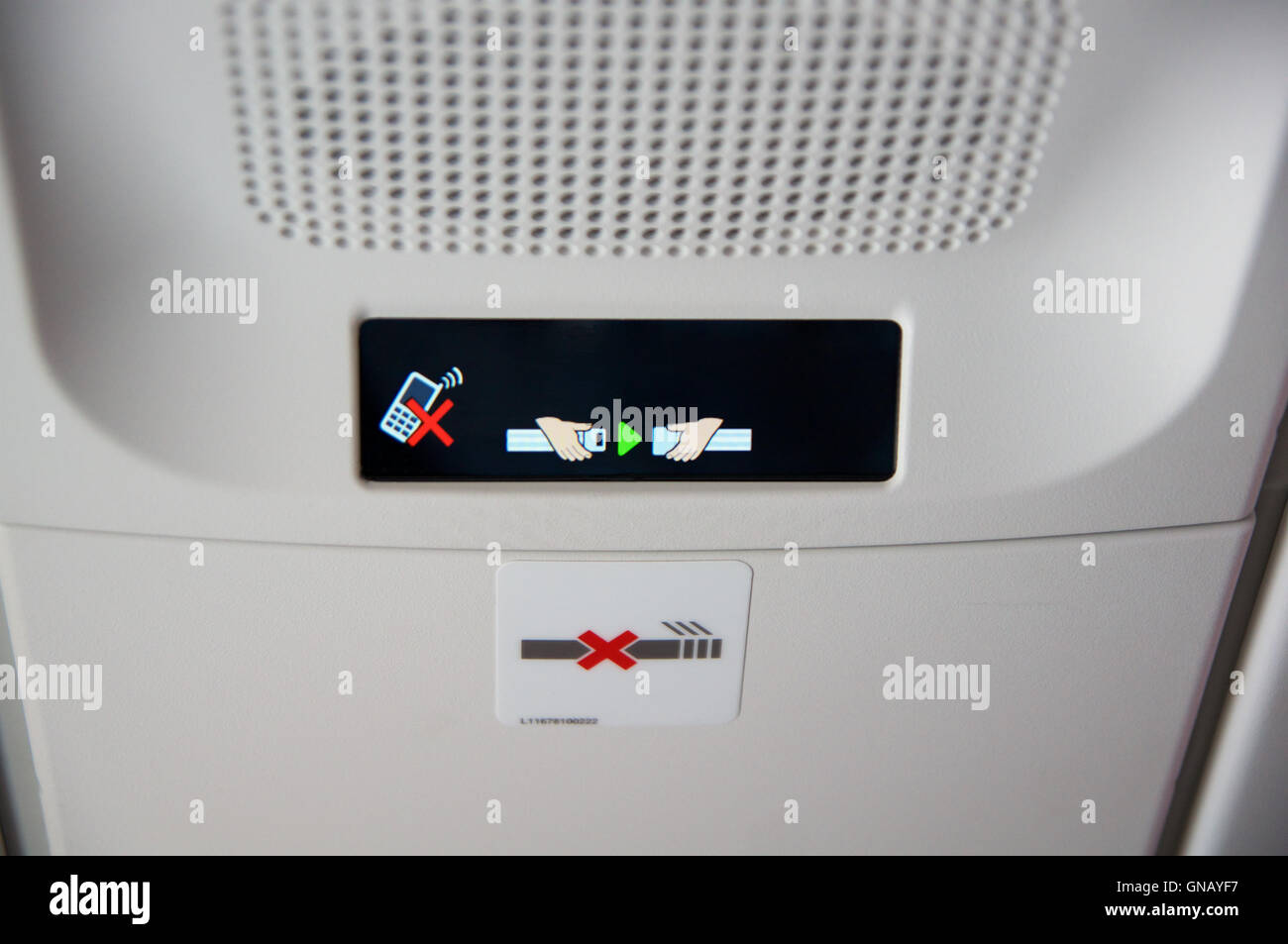 Seatbelt sign plane hi-res stock photography and images - Alamy