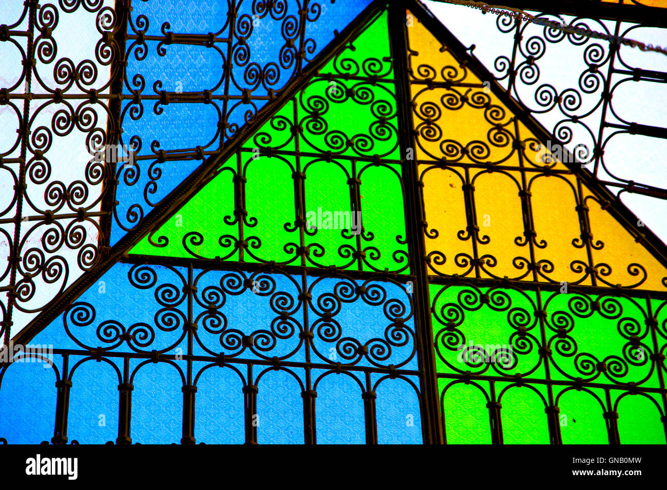 colorated glass and sun in morocco africa window and light Stock Photo ...
