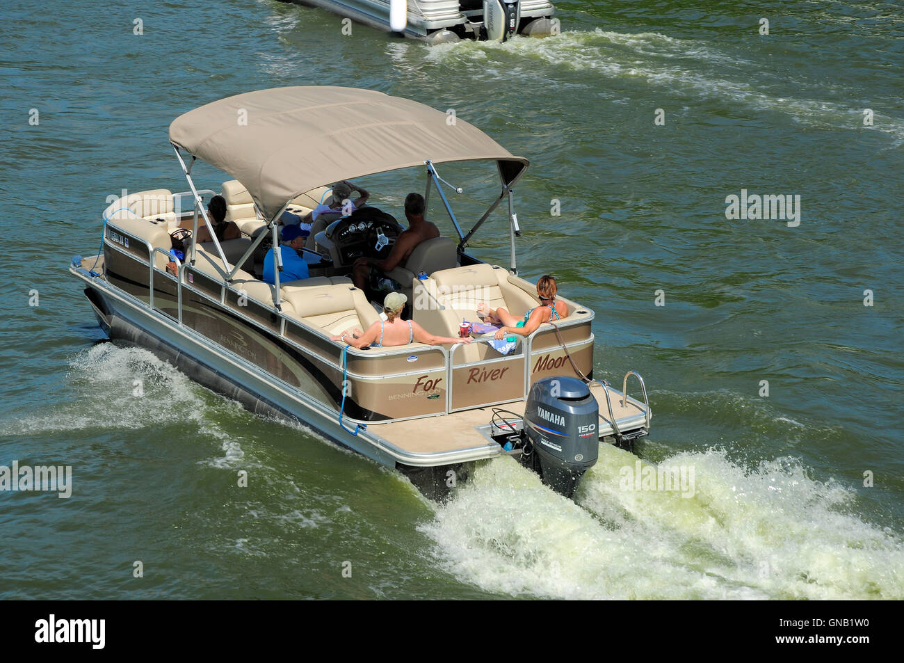 Recreational boating. Pontoon boat Stock Photo - Alamy