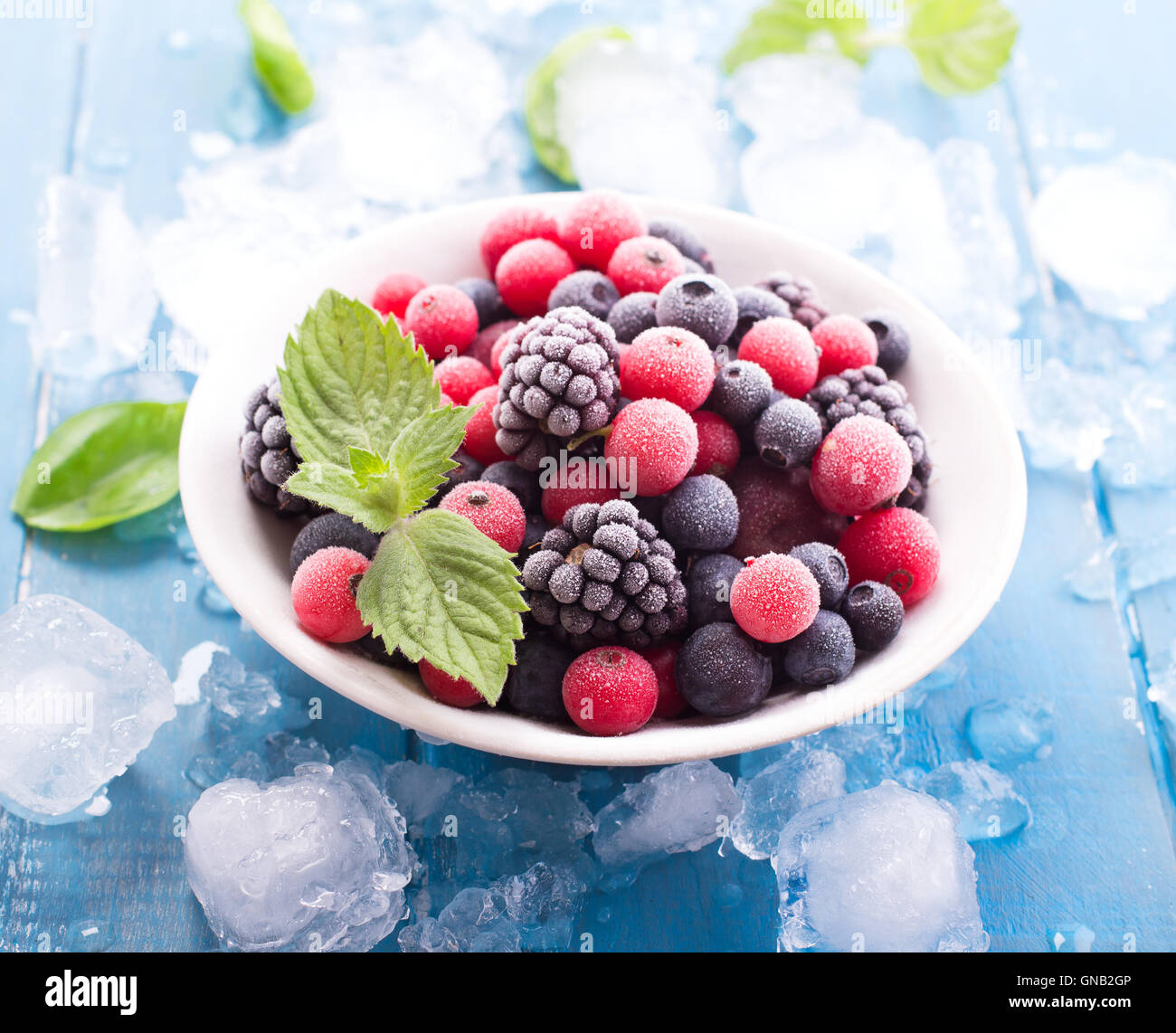 Frozen berry with ice Stock Photo - Alamy