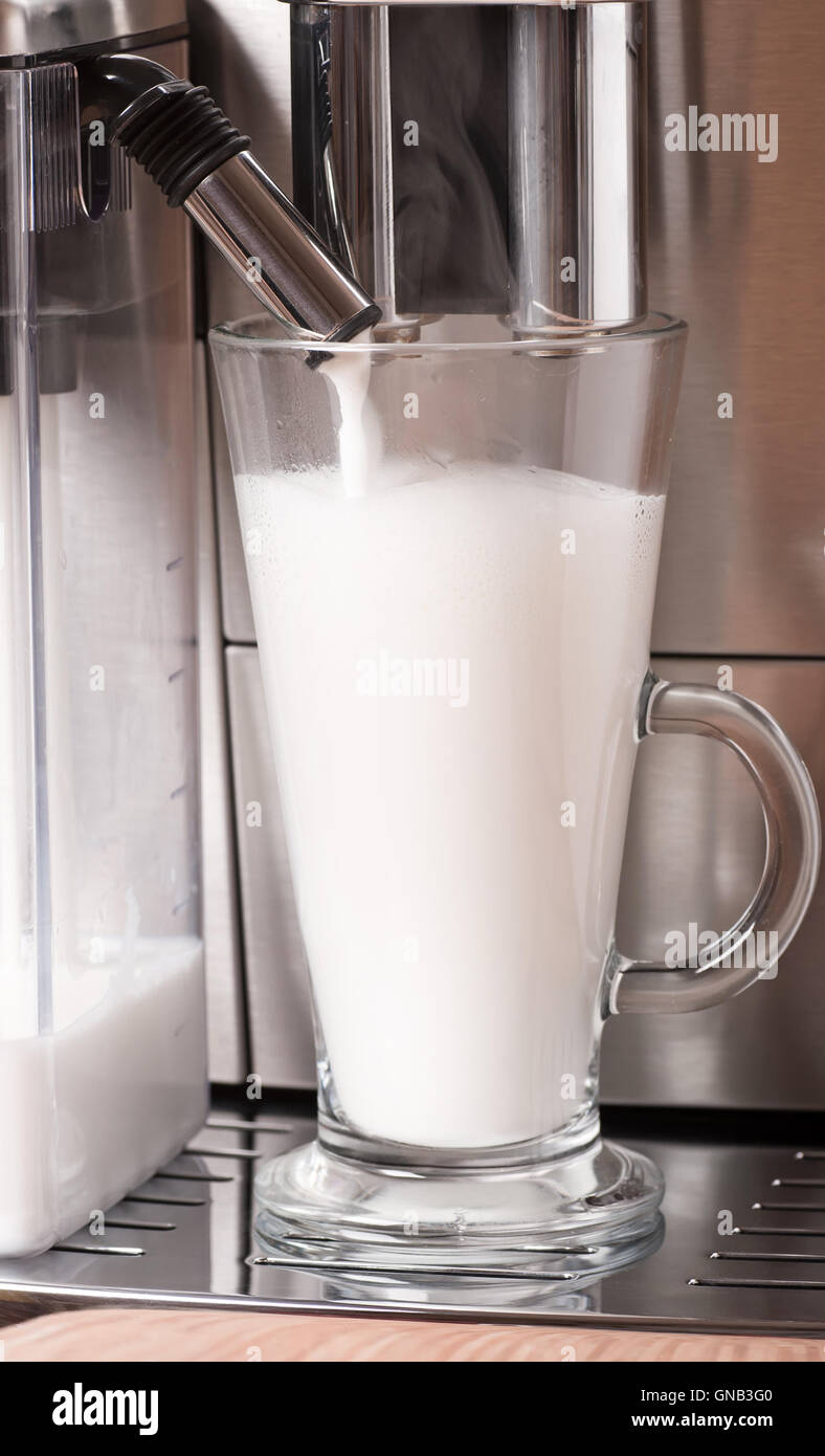 Coffee latte preparation Stock Photo - Alamy