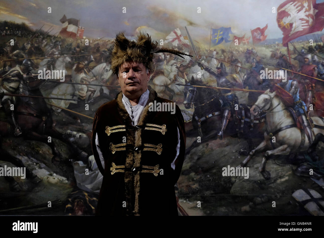 A Polish man wears traditional medieval garment inside the Ordensburg ...