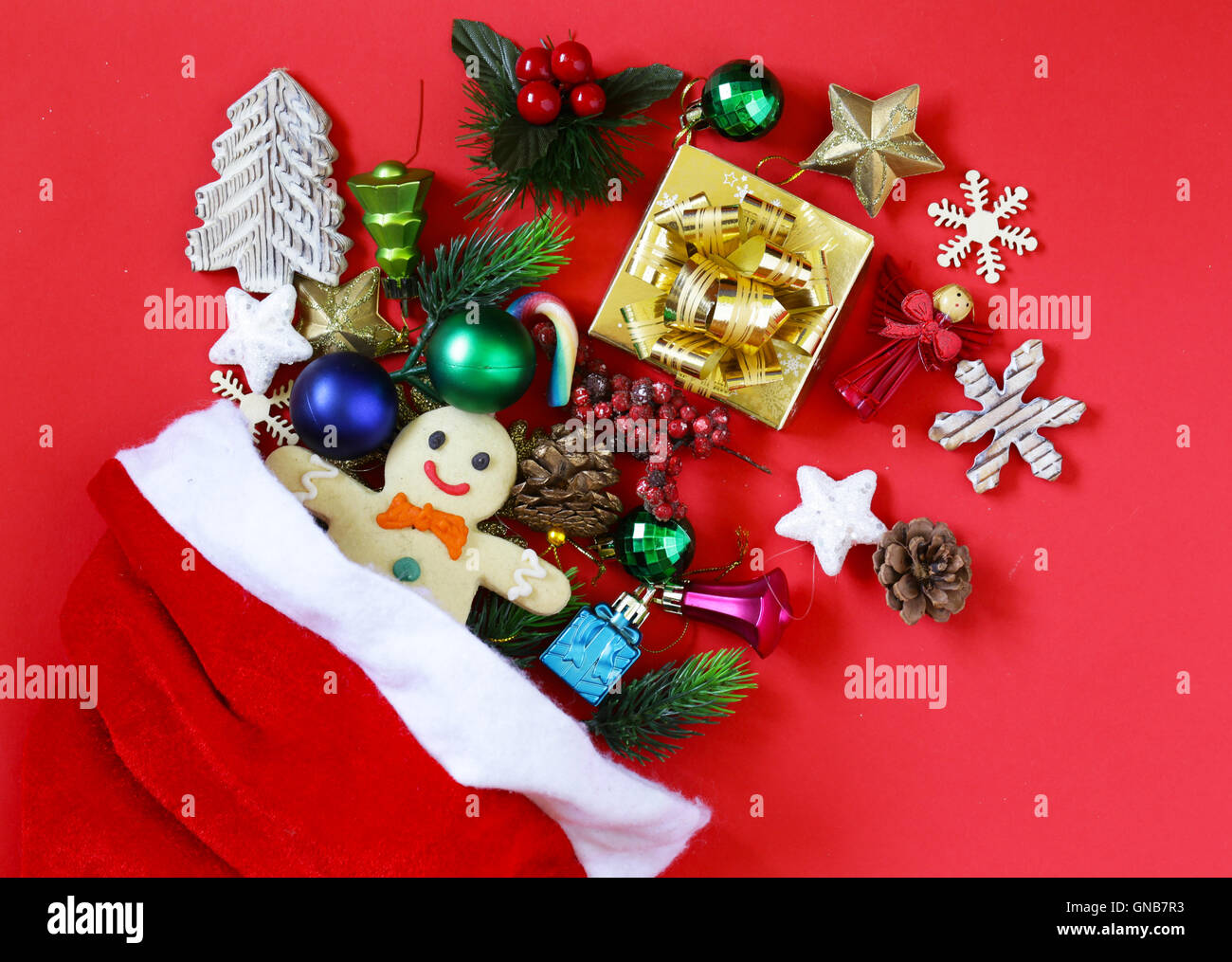 Christmas set - decoration, gifts, candy, gingerbread on the red ...