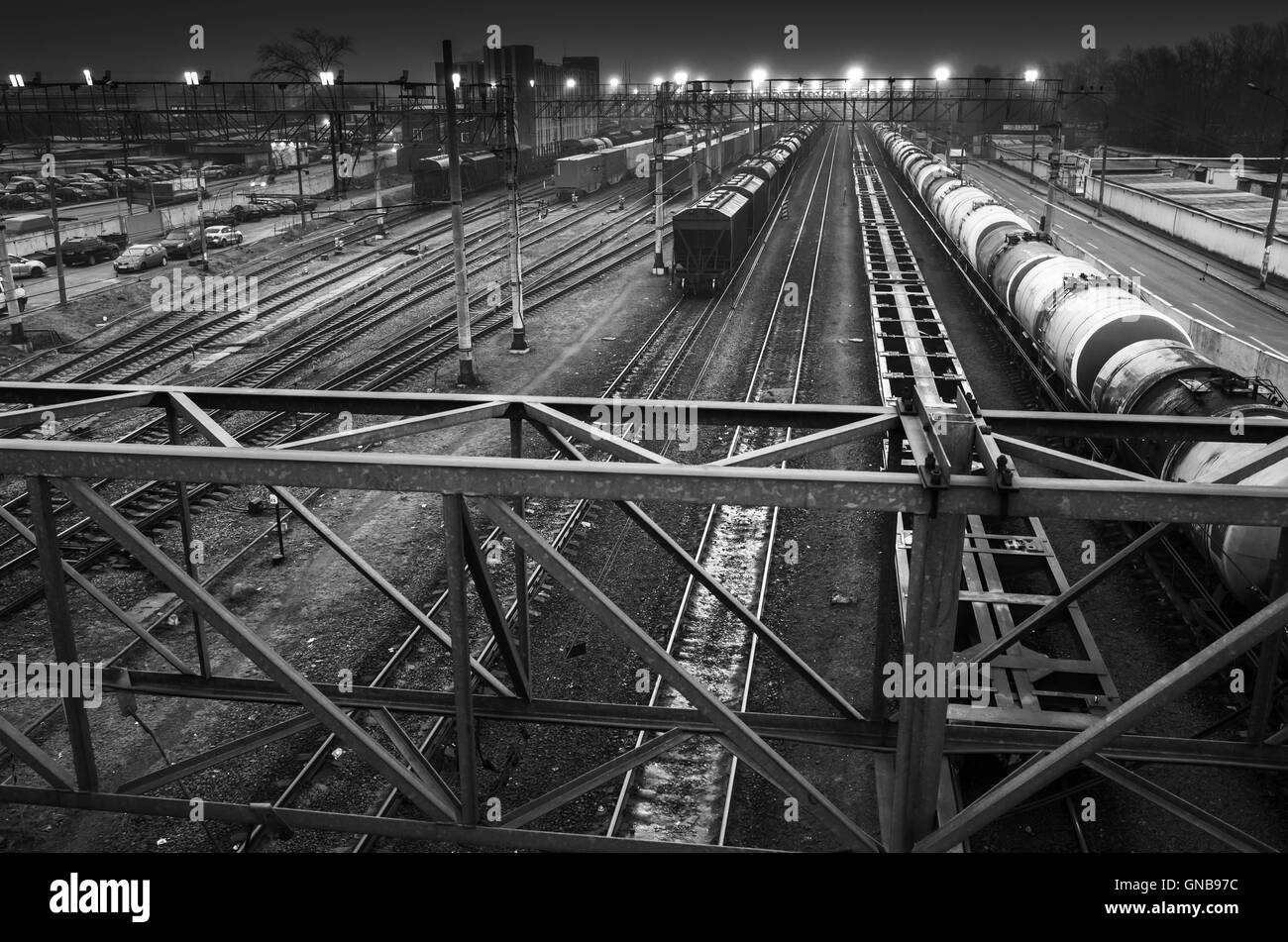 Sorting railway station with illumination at night, black and white ...