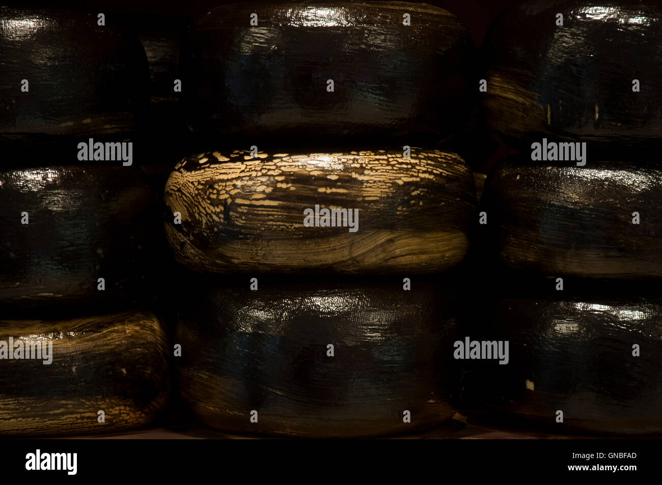 Nine big black Gouda cheese Stock Photo - Alamy
