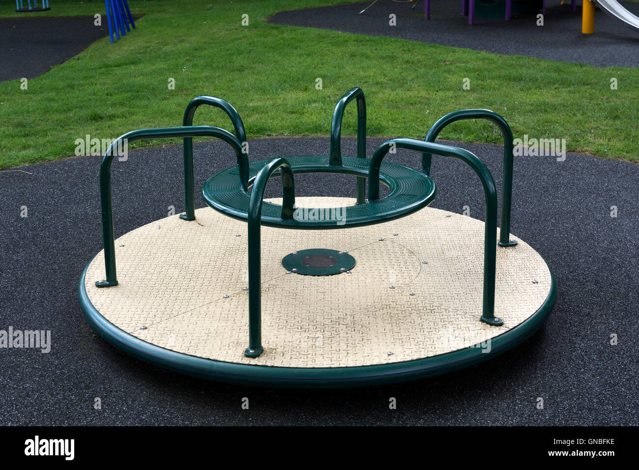Playground ride roundabout hi-res stock photography and images - Alamy