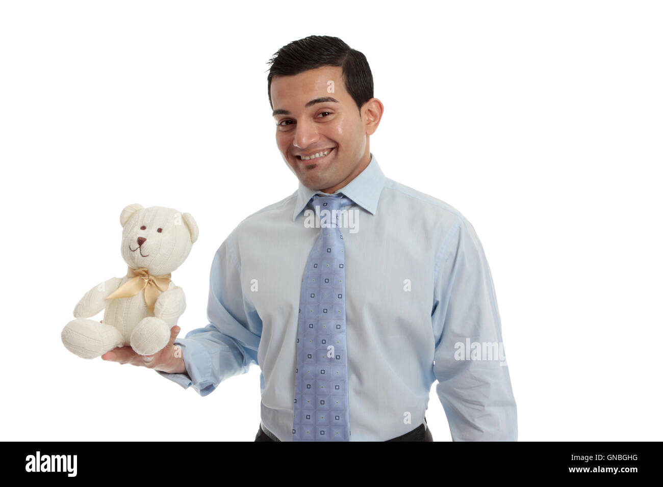 Man holding a knitted teddy bear Stock Photo - Alamy