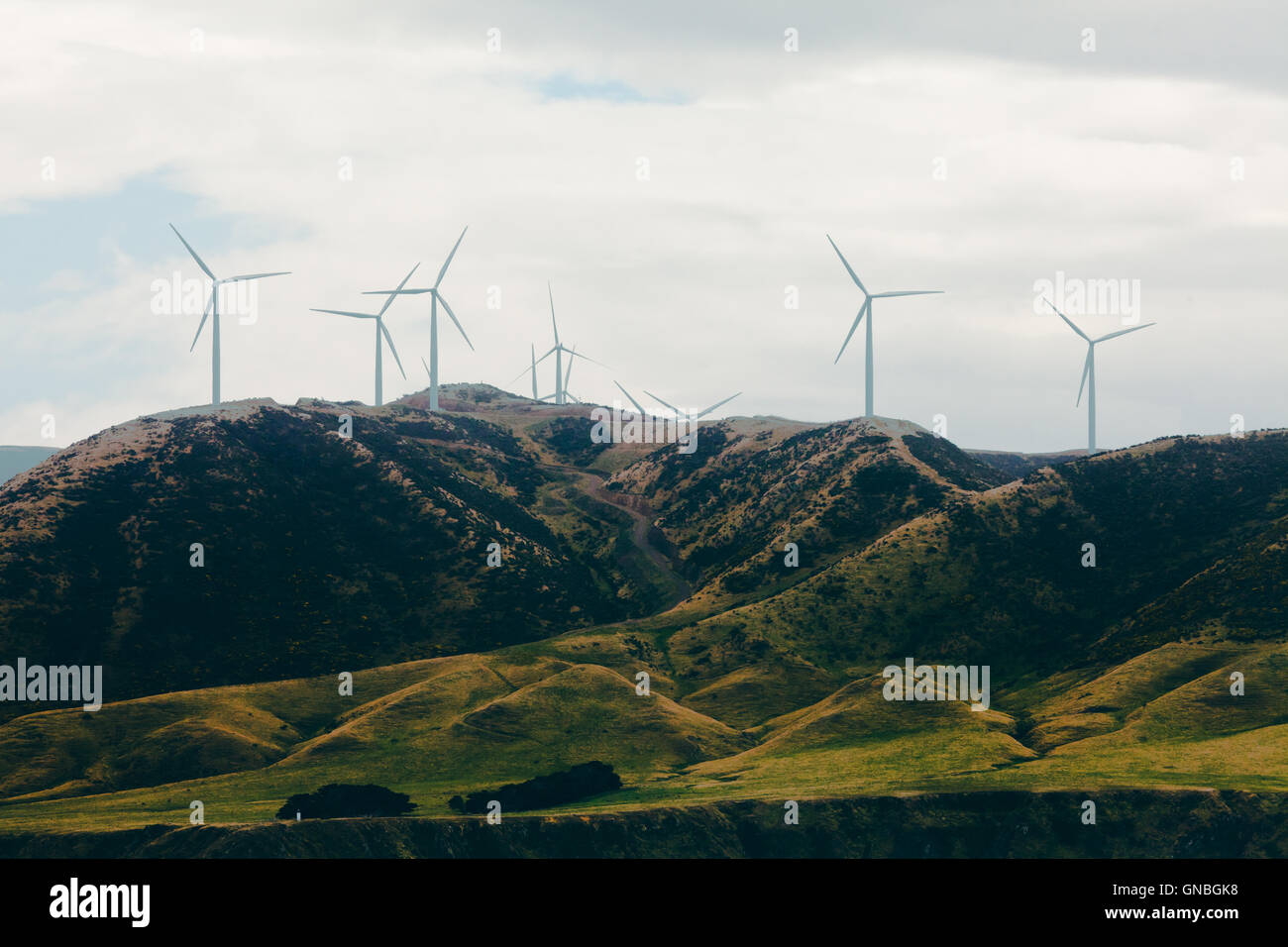 Wind turbines in mountainous terrain Stock Photo - Alamy