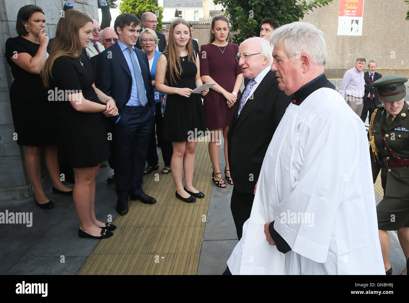 President Michael D. Higgins and Canon Jim O'Donovan arrive for the ...