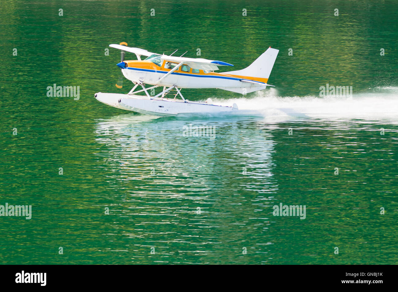 Seaplane Taking Off On Water High Resolution Stock Photography and ...