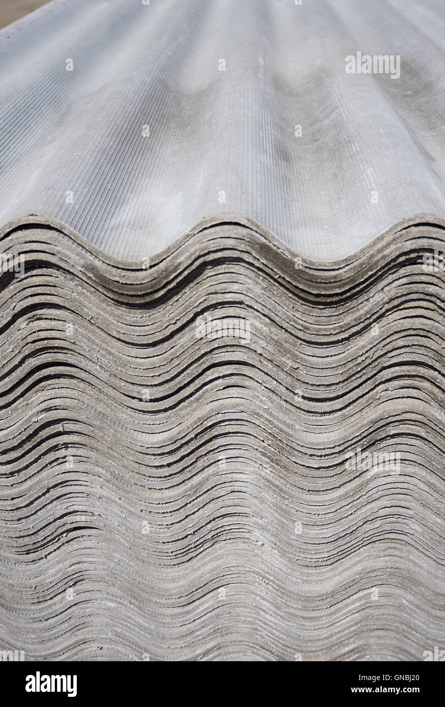 Pack sheets of asbestos slate. Building material for roofing Stock ...