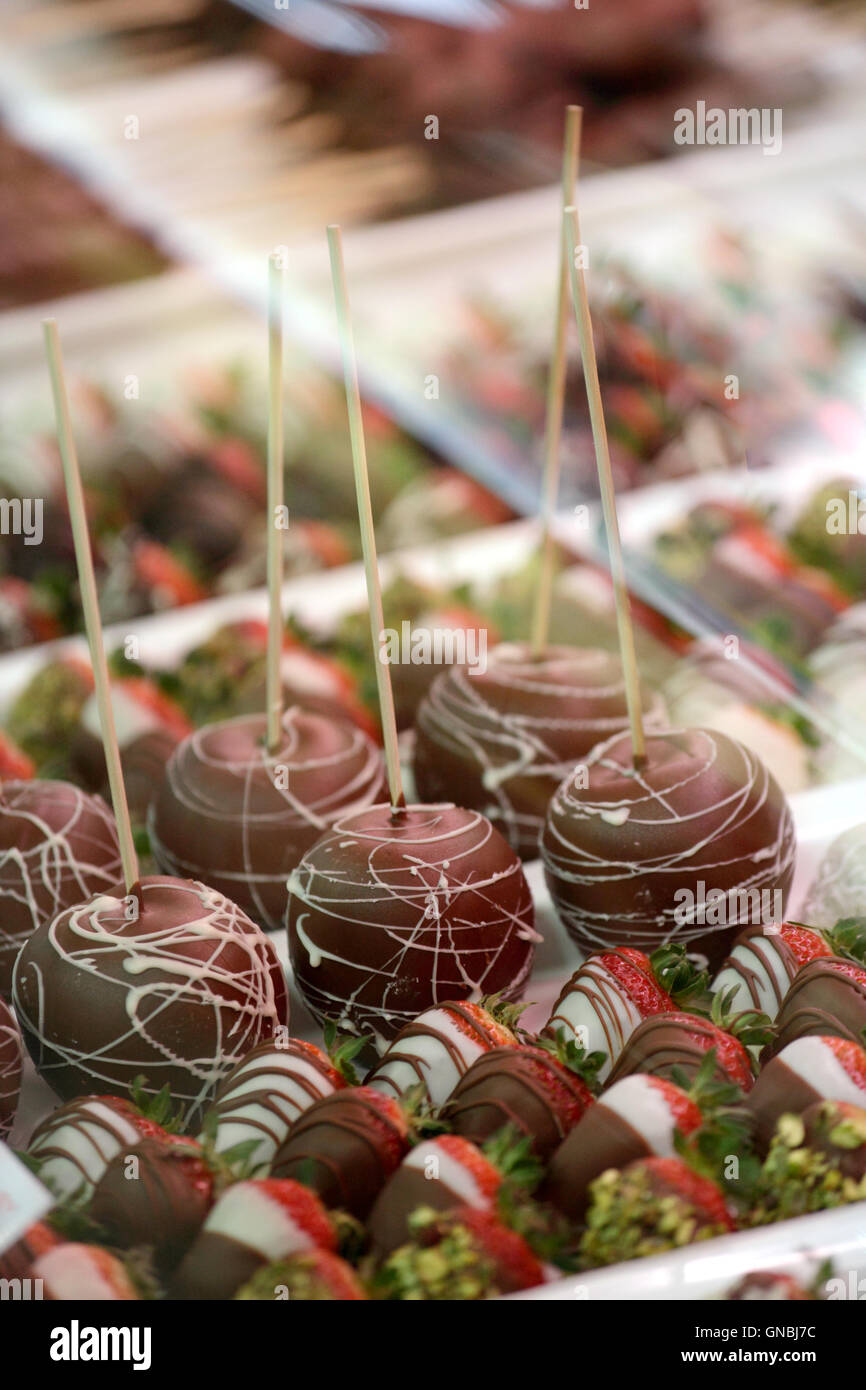 Decadent chocolate coated fruits Stock Photo - Alamy