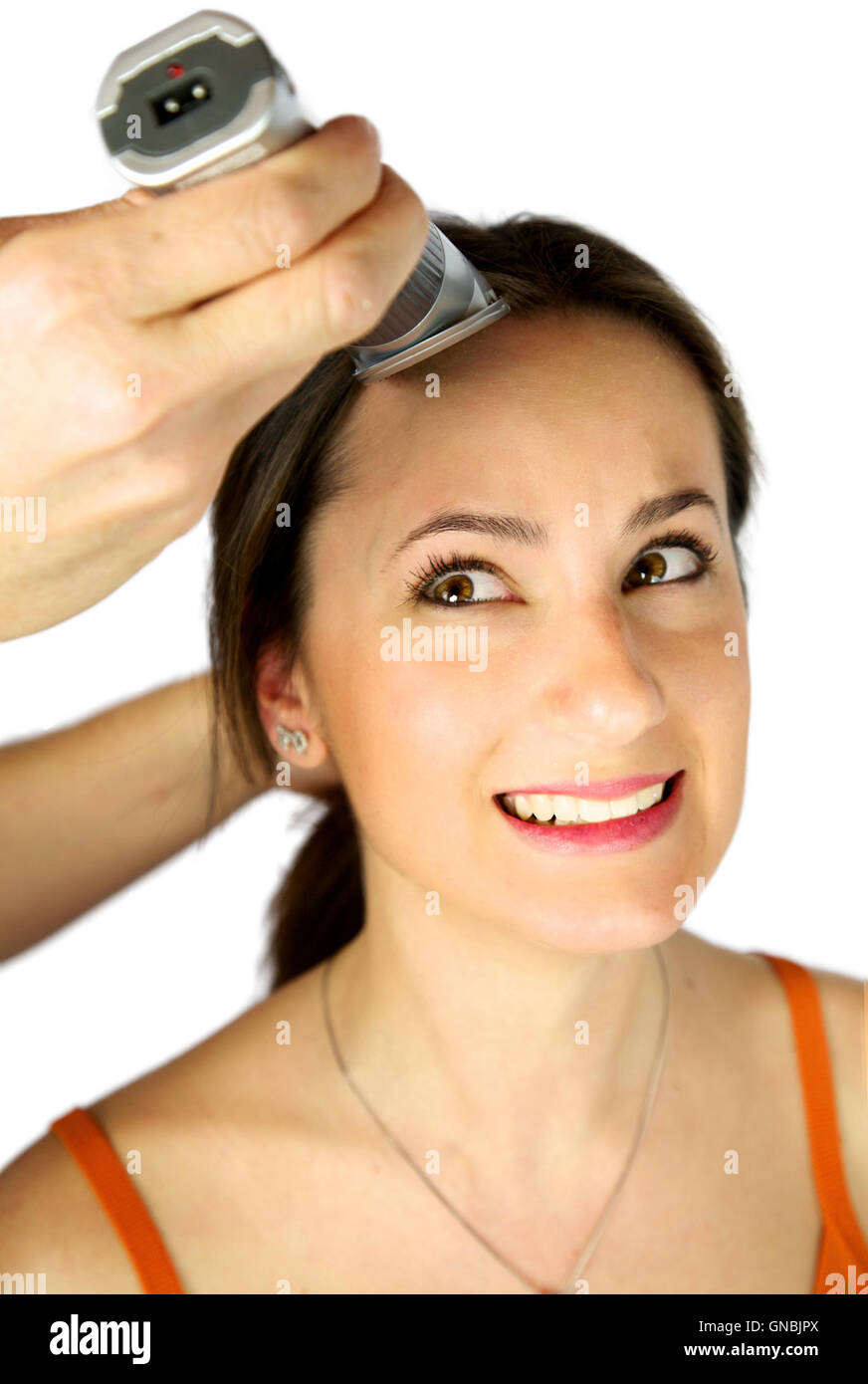Girl with scissors ready to cut hair Stock Photo - Alamy