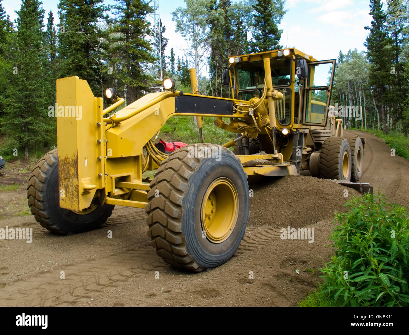 Man with grader hi-res stock photography and images - Alamy