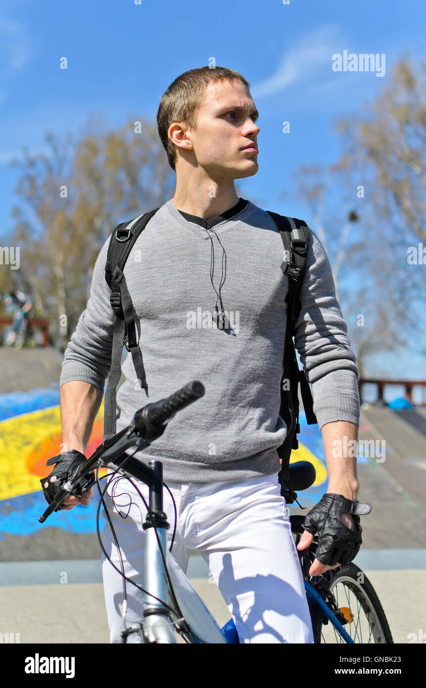 Portrait of BMX bicycle rider on urban skatepark background Stock Photo ...