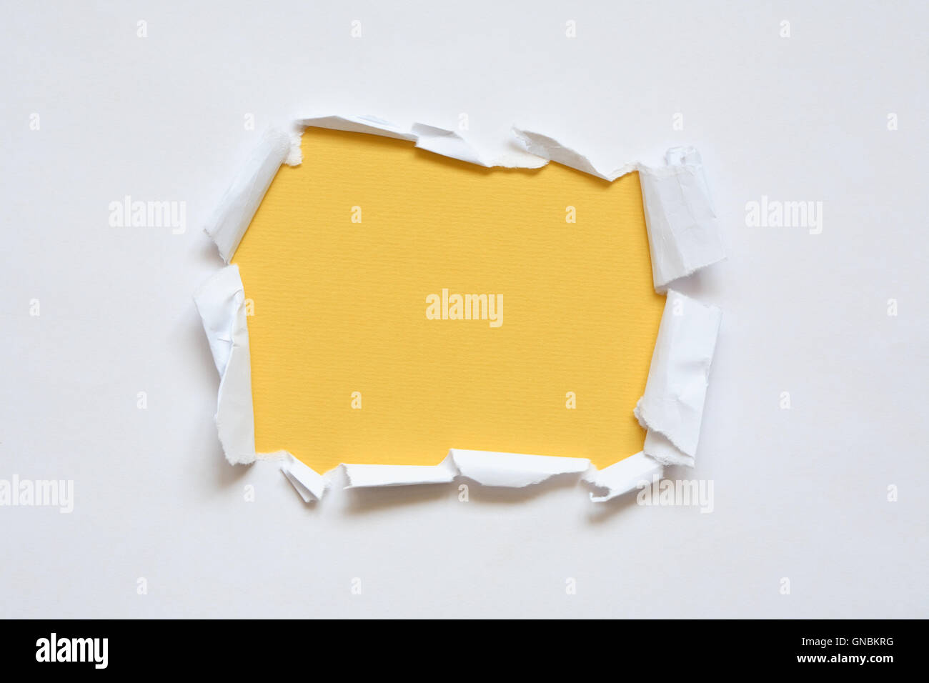 Hole In Paper Stock Photo - Alamy