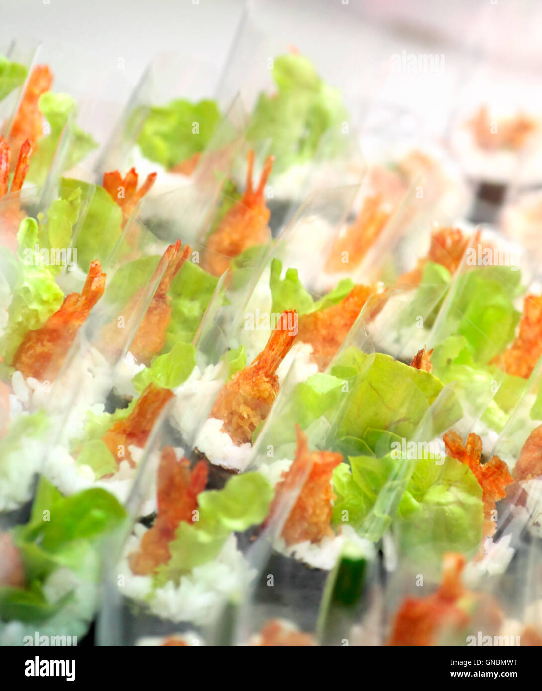Individual sushi on display Stock Photo - Alamy
