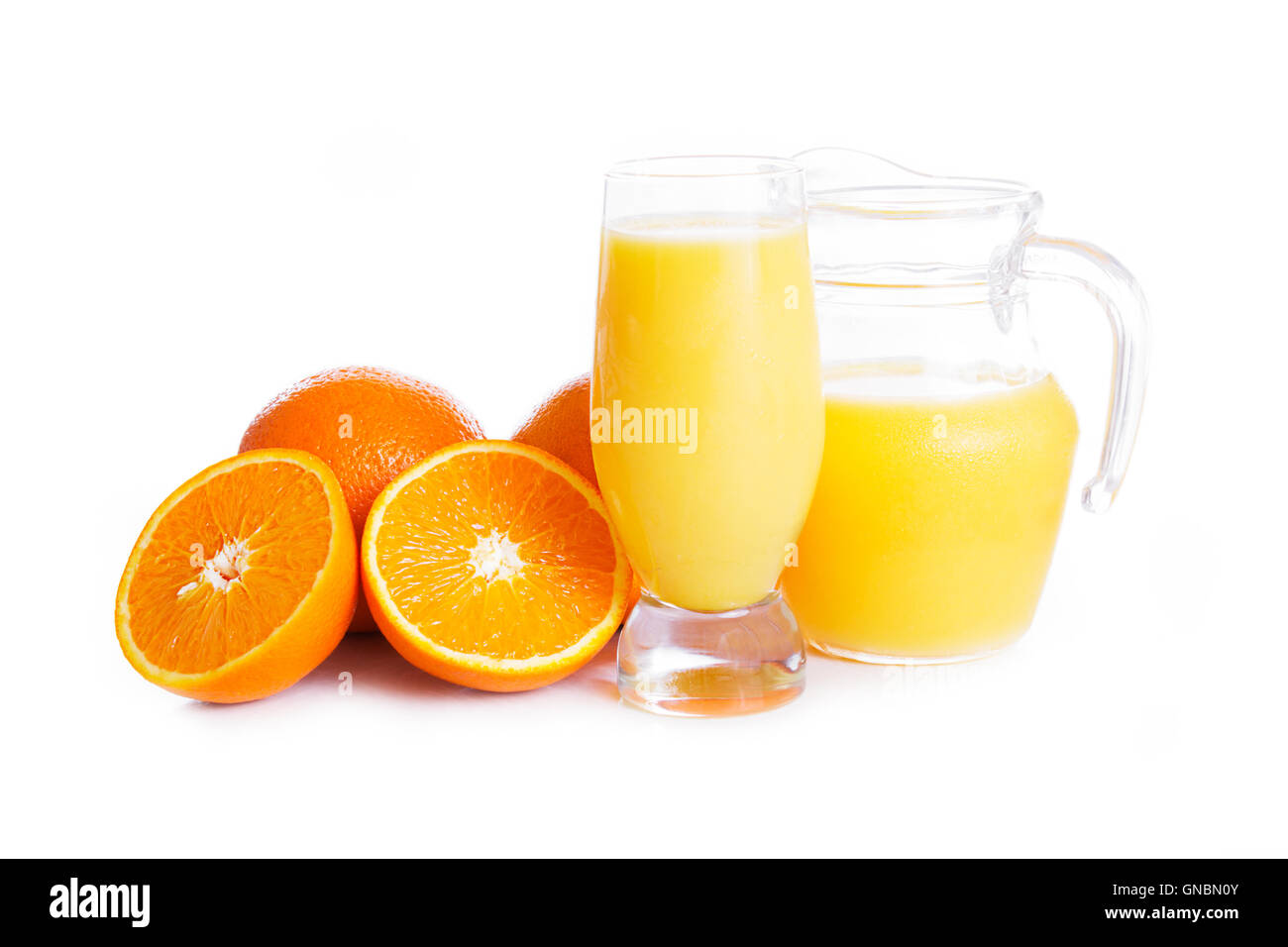 Orange juice in jug and glass Stock Photo - Alamy