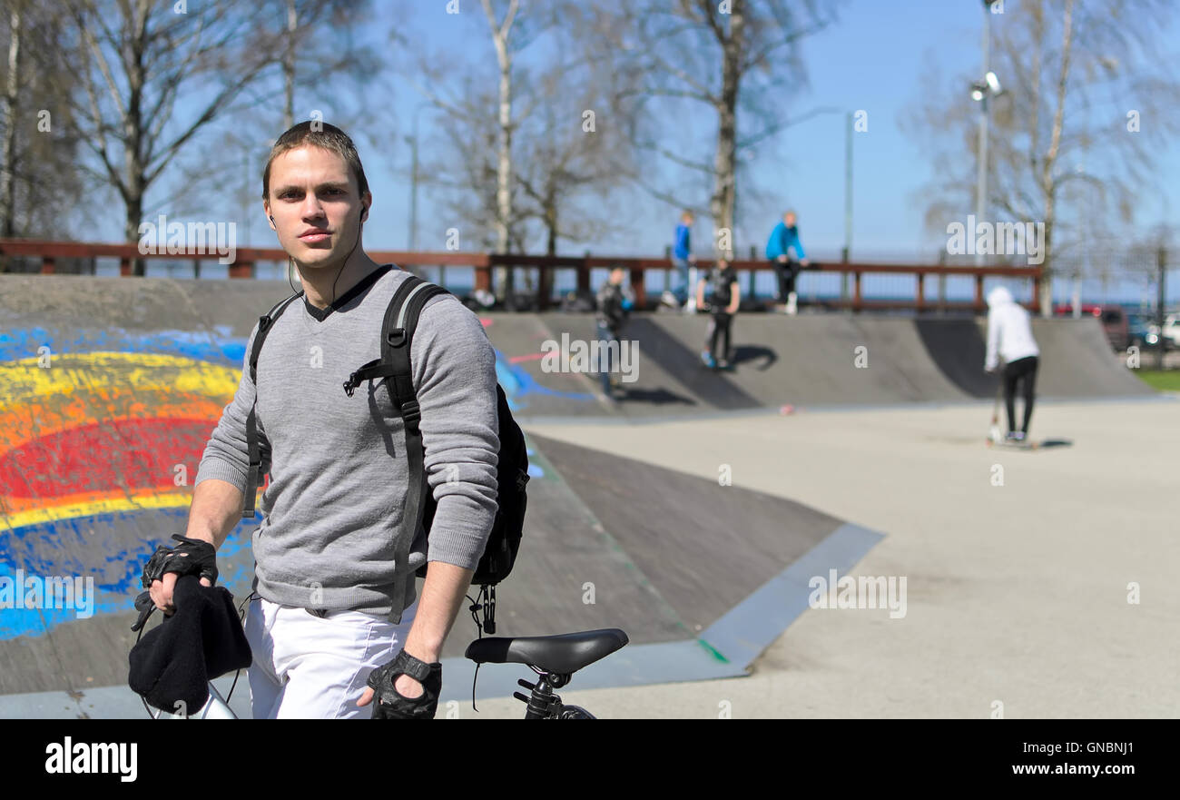 Portrait of BMX bicycle rider on urban skatepark background Stock Photo ...