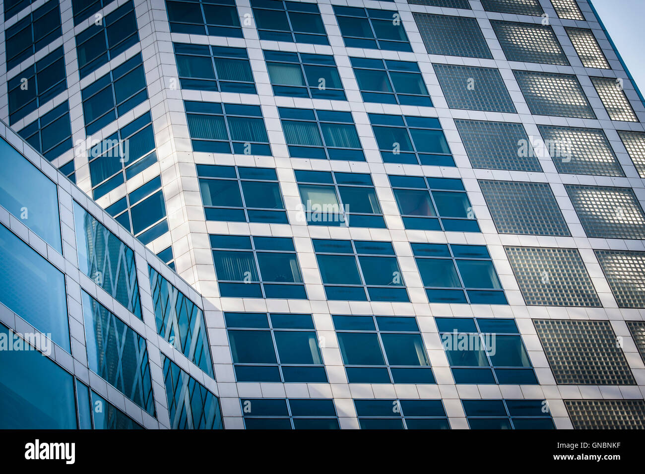 Blue glass office facade Stock Photo - Alamy