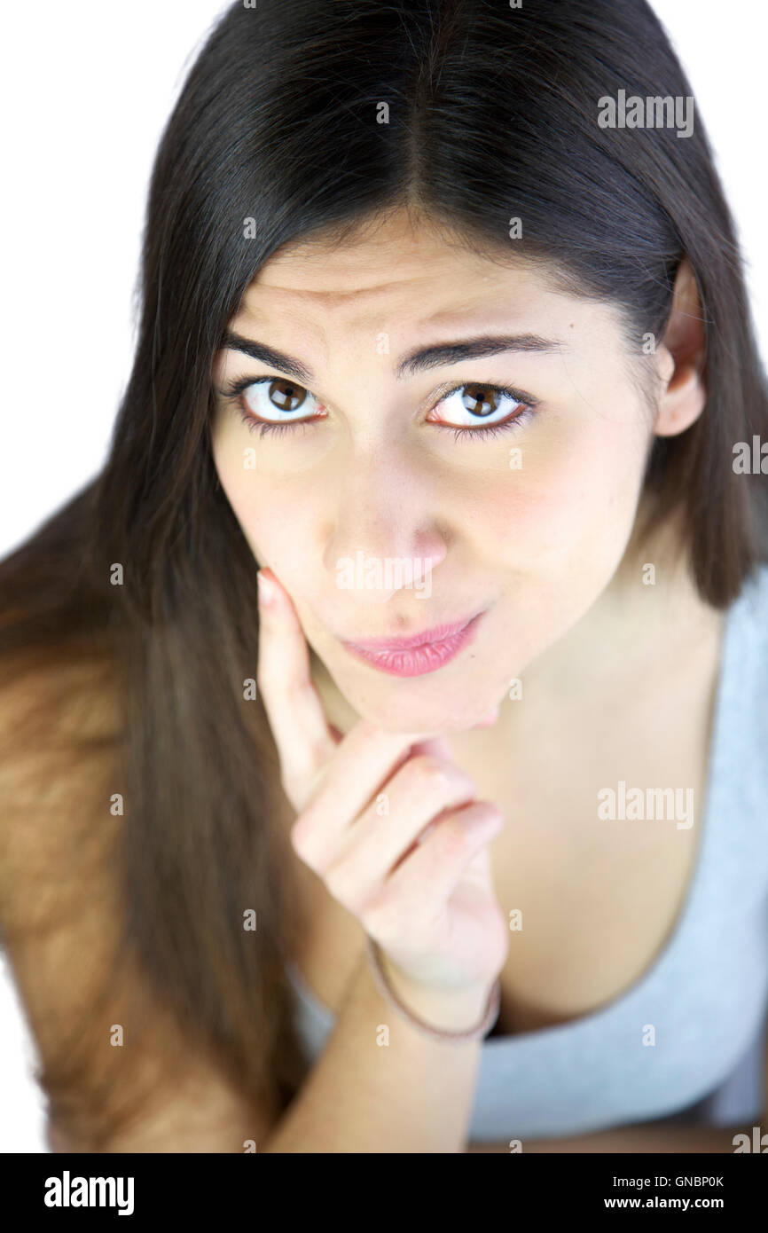 Brunette female model thinking Stock Photo - Alamy