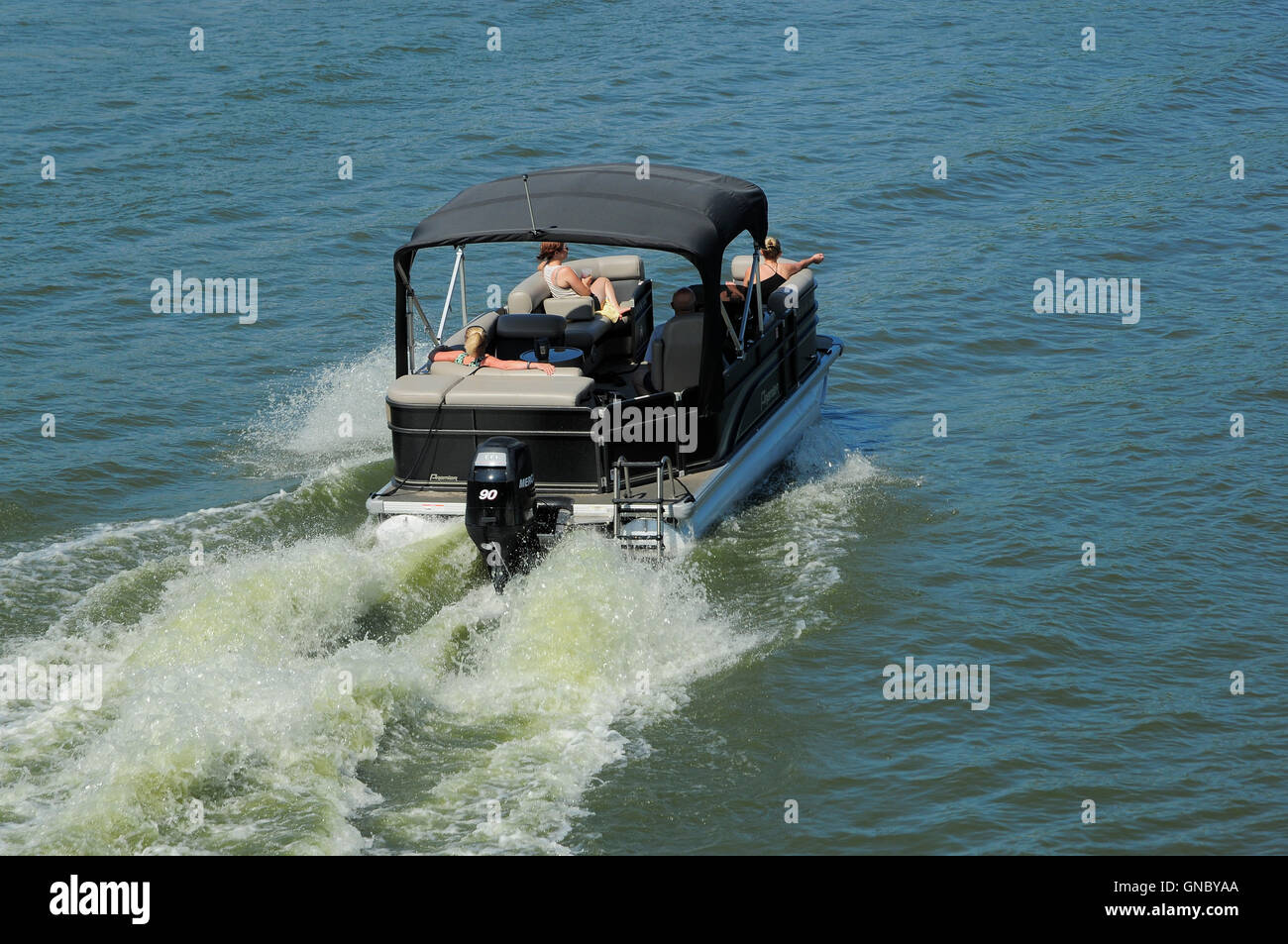 Recreational boating. Pontoon boat Stock Photo - Alamy