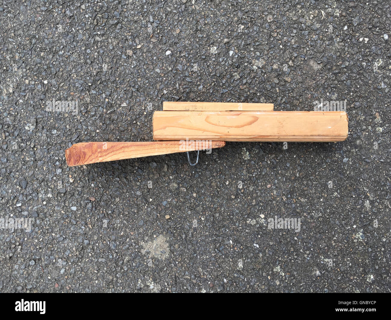 It's a photo of a Wood Weapon Toy homemade by kid Stock Photo - Alamy