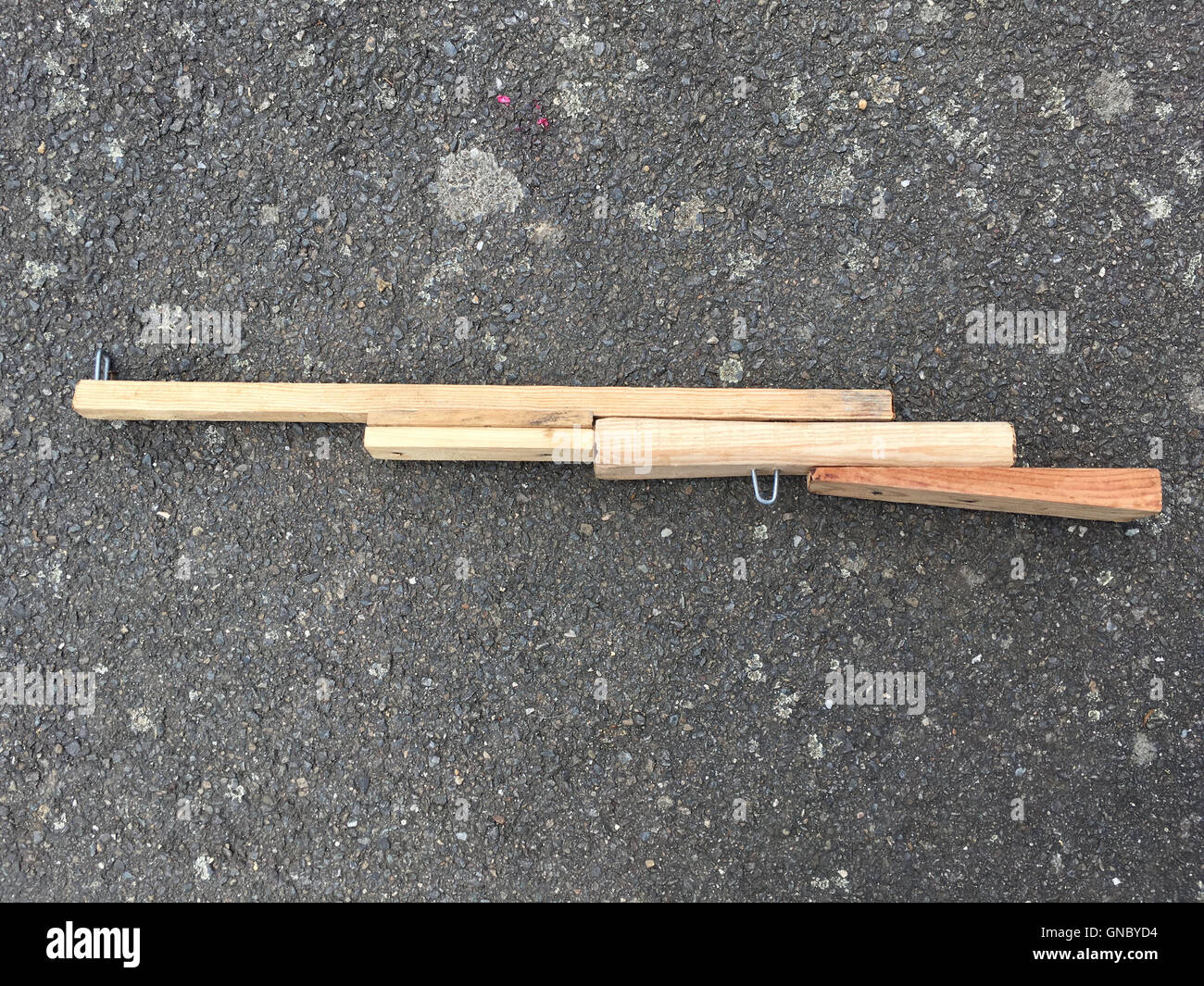 It's a photo of a Wood Weapon Toy homemade by kid Stock Photo - Alamy