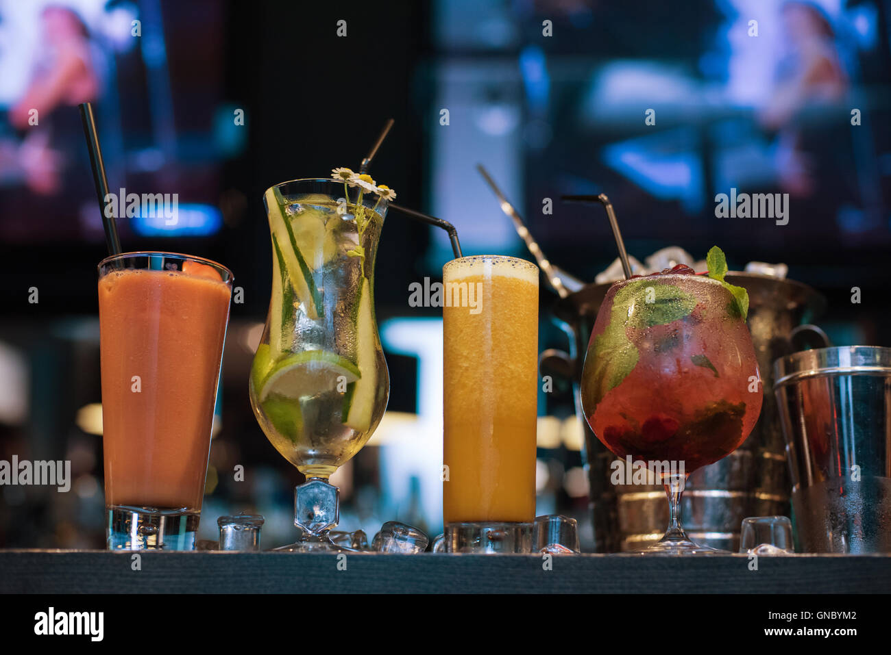 cocktails on bar background Stock Photo - Alamy