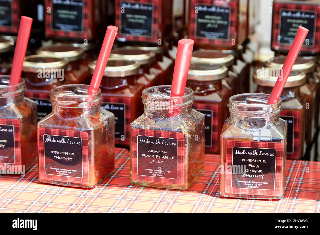 home made chutneys for sale on a food stall in the uk Stock Photo - Alamy