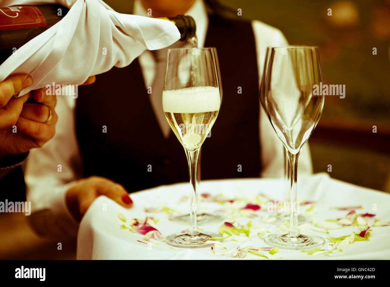 Waiter tray champagne hi-res stock photography and images - Alamy