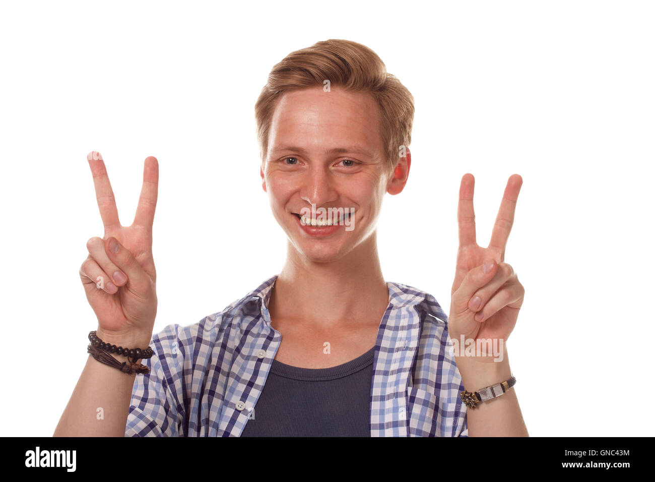 handsome young man showing victory fingers sign (isolated on white ...