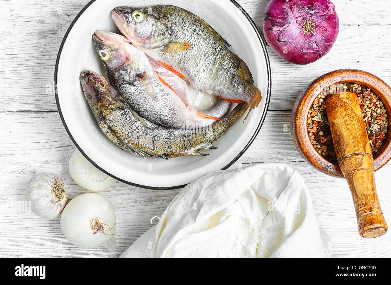 Uncooked fish flour cooking in hi-res stock photography and images - Alamy