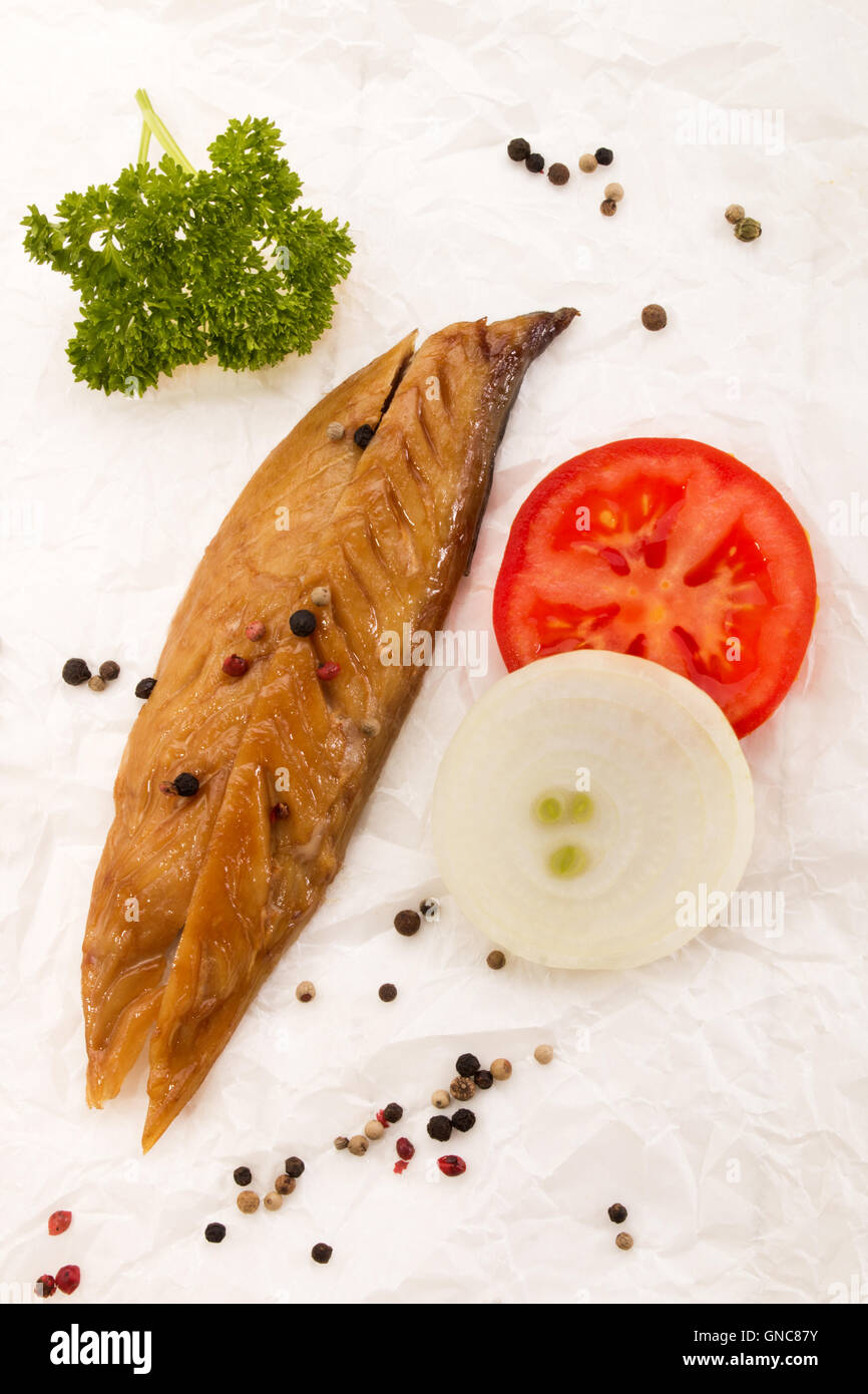 gently smoked scottish mackerel on white kitchen paper with tomato ...
