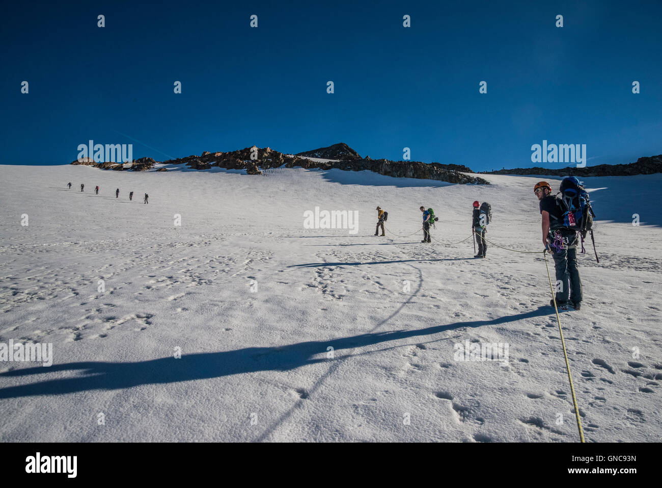 The Stubai Alps. Young people learning alpine climbing Stock Photo - Alamy