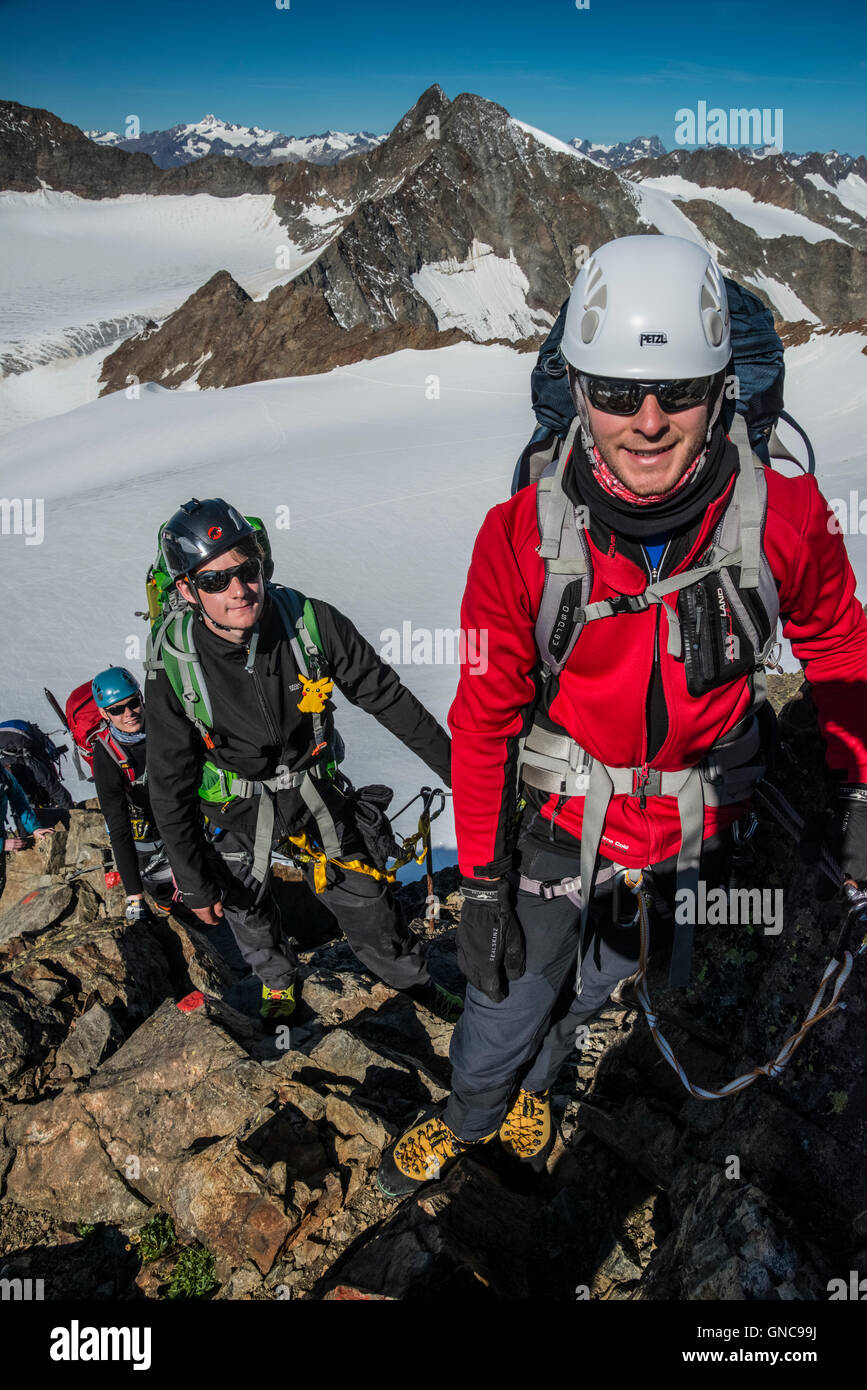 The Stubai Alps. Young people learning alpine climbing Stock Photo - Alamy