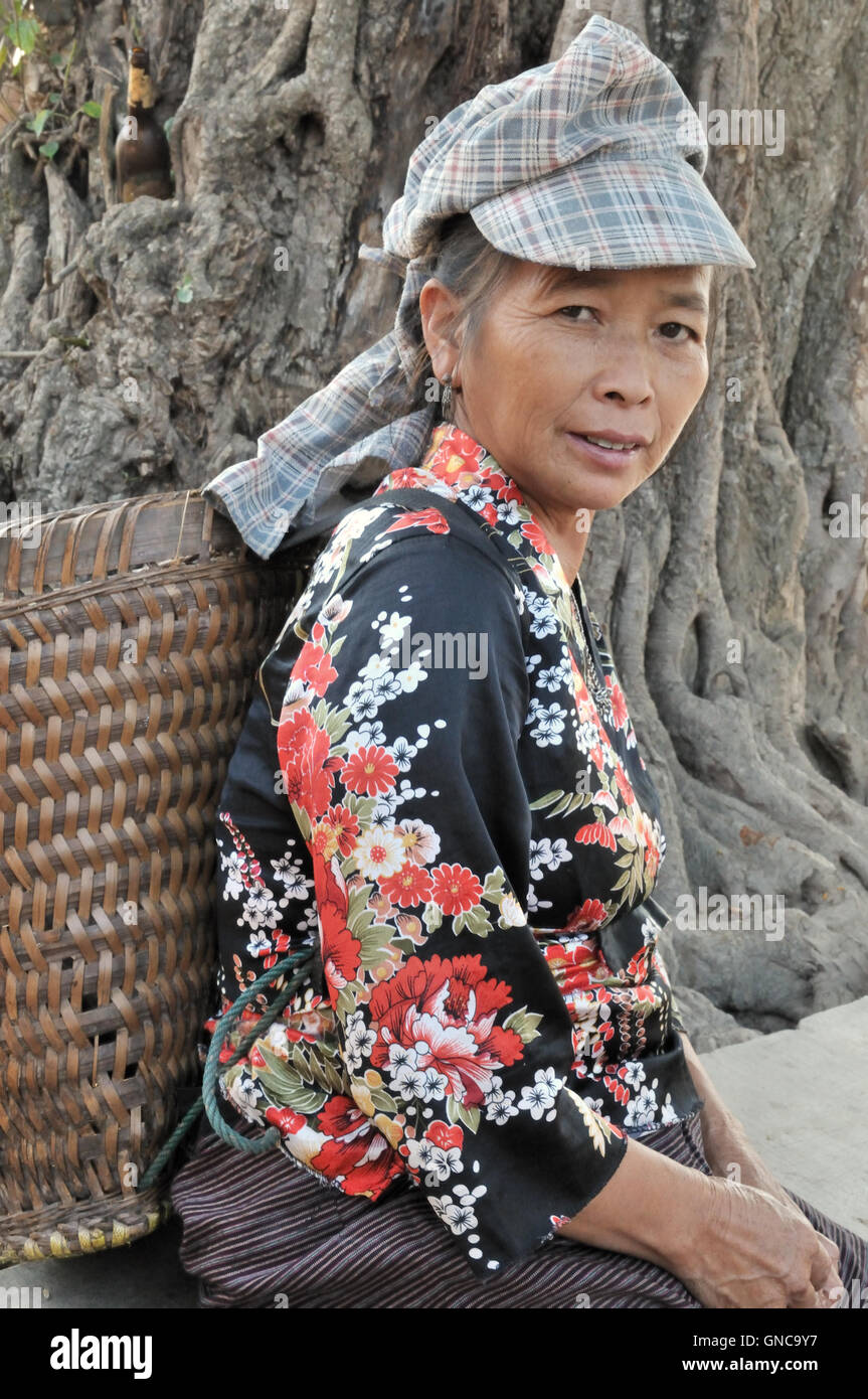 Hmong Village, Lady Carrying Basket on her Back Stock Photo - Alamy