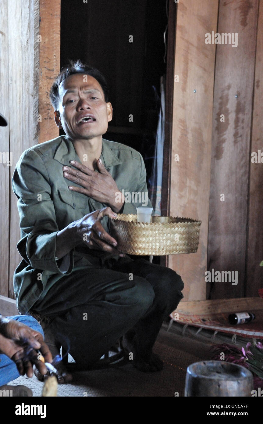 Khamu Village, Man Smoking At Wedding Ceremony Stock Photo - Alamy