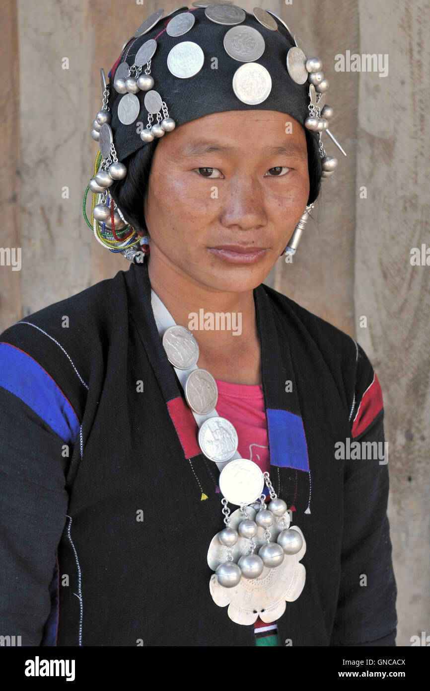 Akha Lady Wearing Traditional Dress With Silver Coins Stock Photo - Alamy