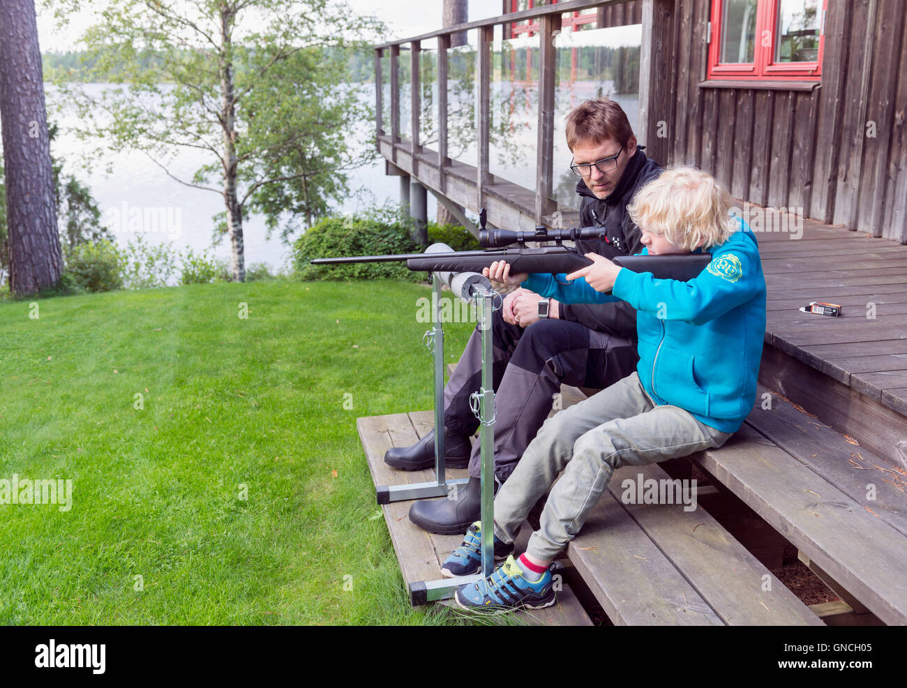 Learning how to shoot Stock Photo - Alamy