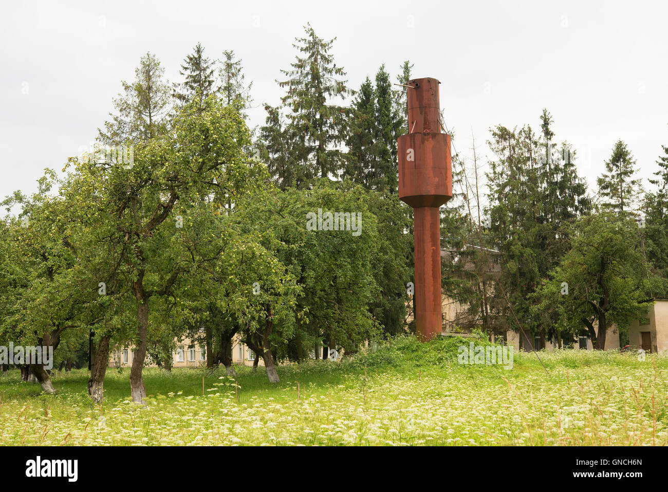 an old water tower on a farm Stock Photo - Alamy