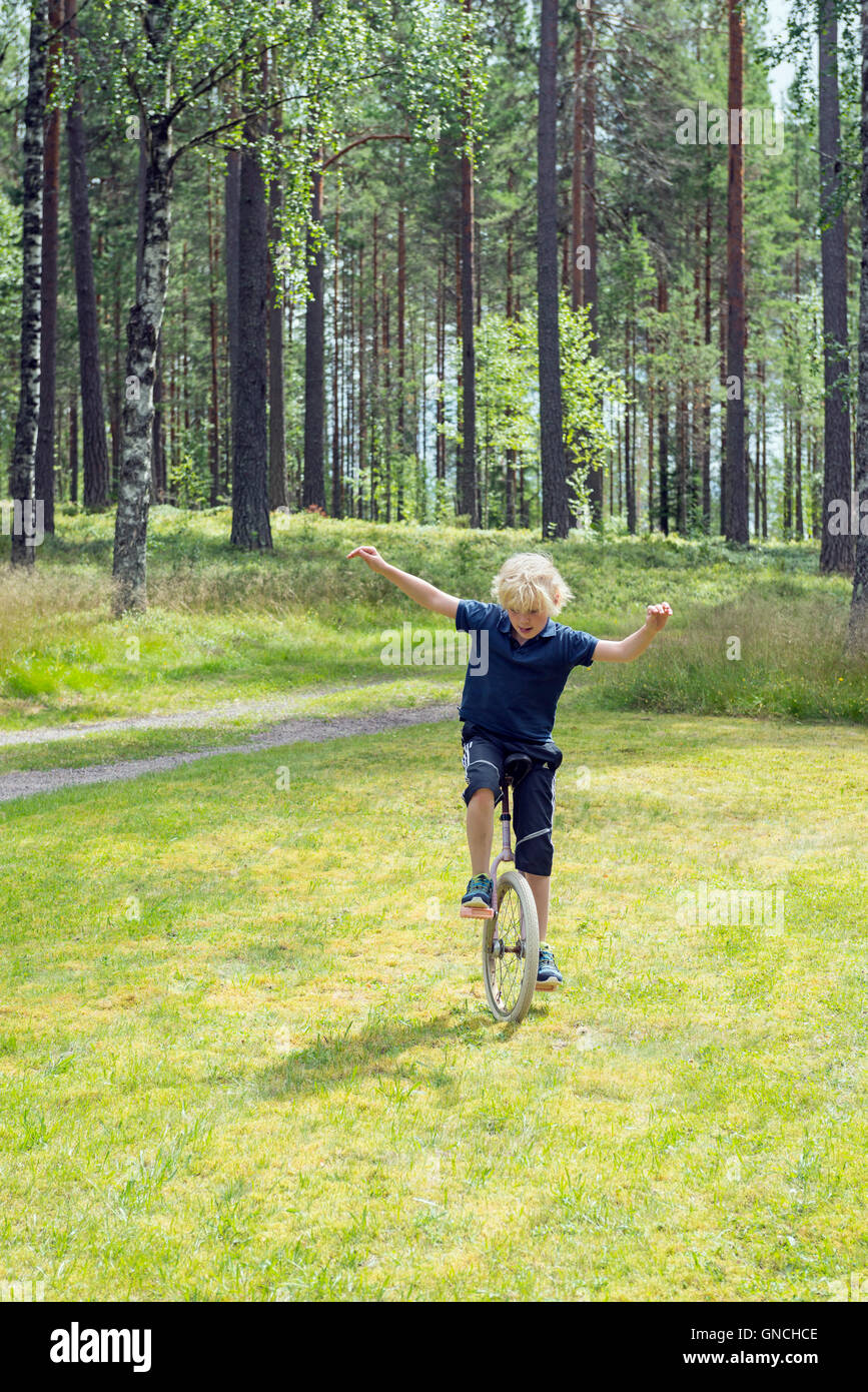 Unicycle child hi-res stock photography and images - Alamy
